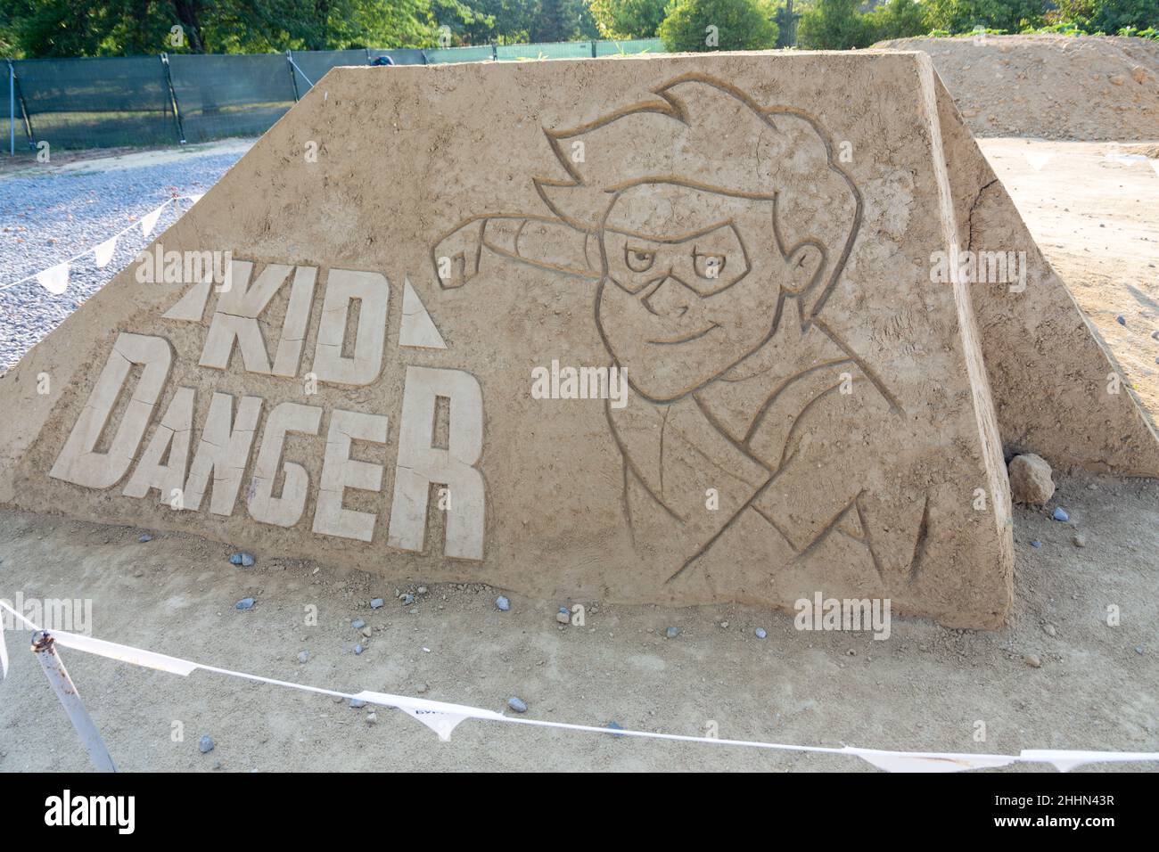 Sand figures of cartoon characters exhibited in the sea garden in ...