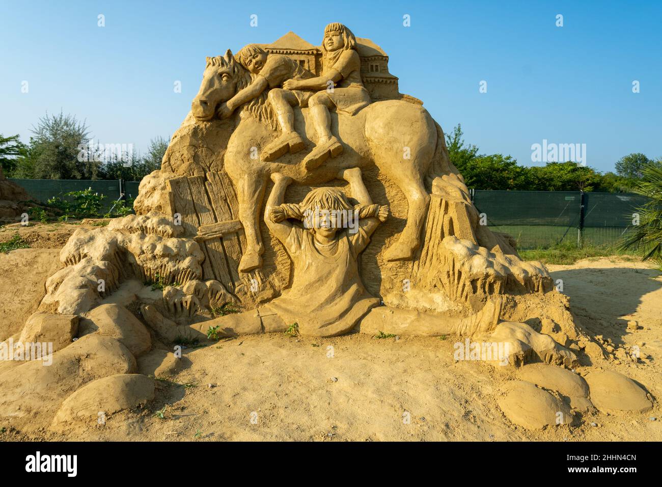 Sand figures of cartoon characters exhibited in the sea garden in ...