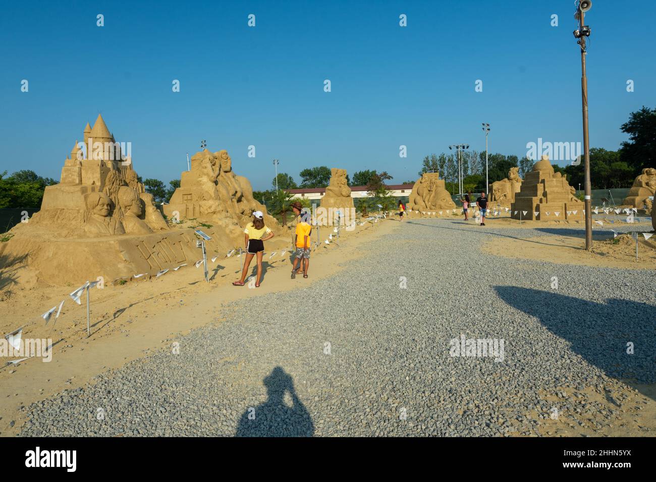 Sand figures of cartoon characters exhibited in the sea garden in ...