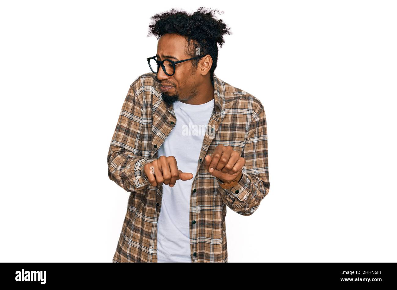 Young african american man with beard wearing casual clothes and ...