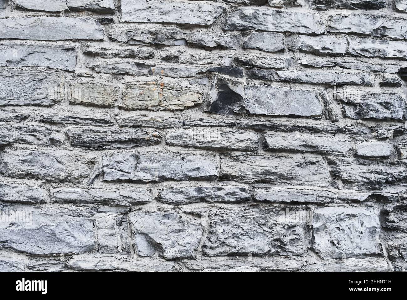 Stone brick wall surface background Stock Photo - Alamy