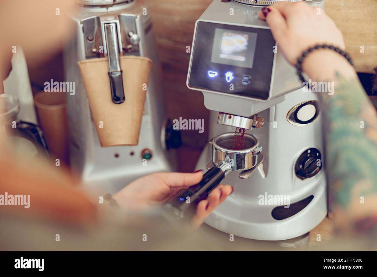Female barista hands using professional coffee machine in cafe Stock Photo - Alamy