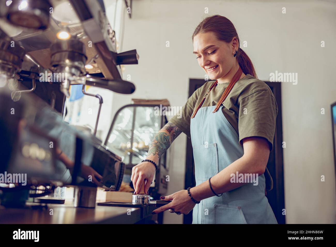 Cheerful barista hi-res stock photography and images - Alamy