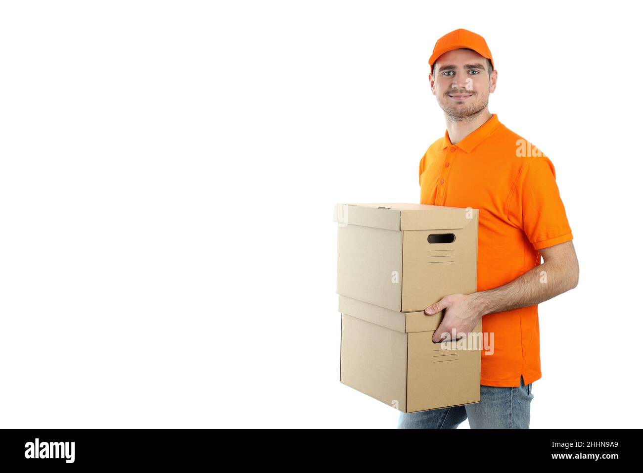 Delivery man holds boxes, isolated on white background Stock Photo - Alamy