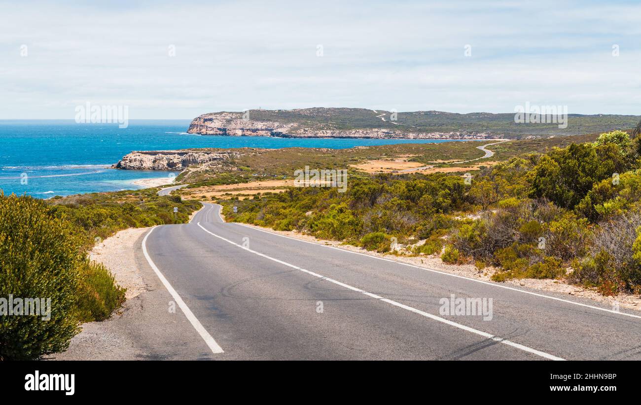 Winding road along the coast of Innes National Park on a bright day ...