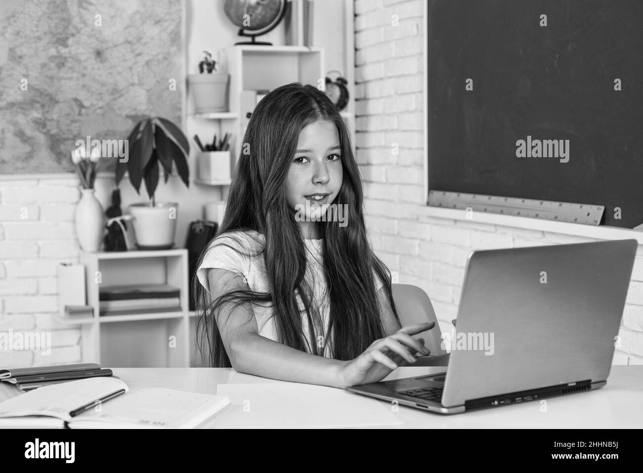 Pupil kid study at school in workplace classroom, learning Stock Photo ...