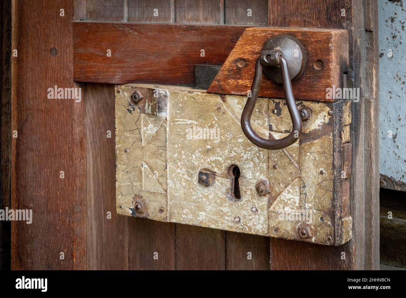 Antique heavy timber church door lock and metal ring handle Stock Photo ...