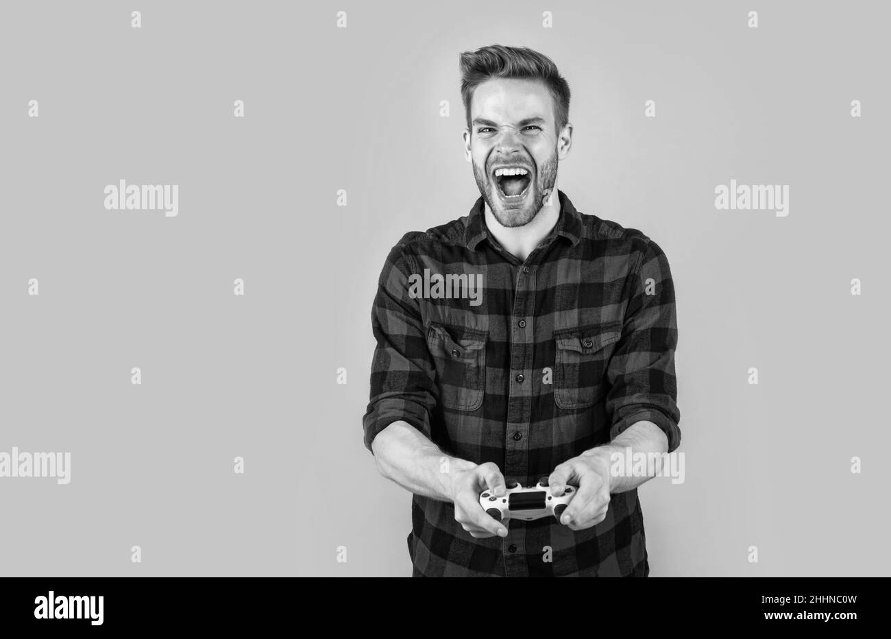 living in digital world. male hobby and free time. gamer in checkered ...