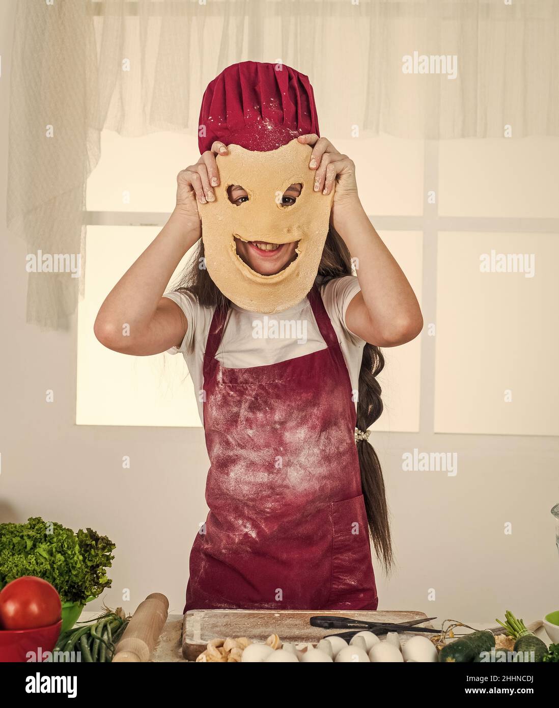 child having fun while cooking, smile Stock Photo - Alamy
