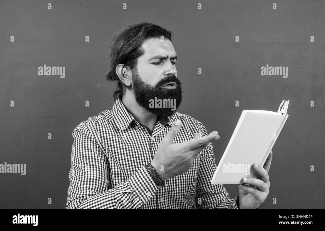 man with beard and moustache look as businessman or teacher in college ...