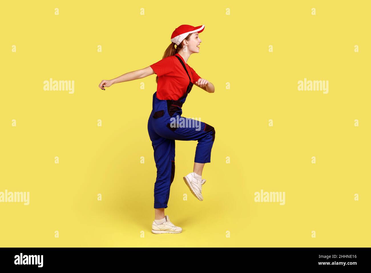 Side view portrait of worker woman marching, going for work, expressing ...