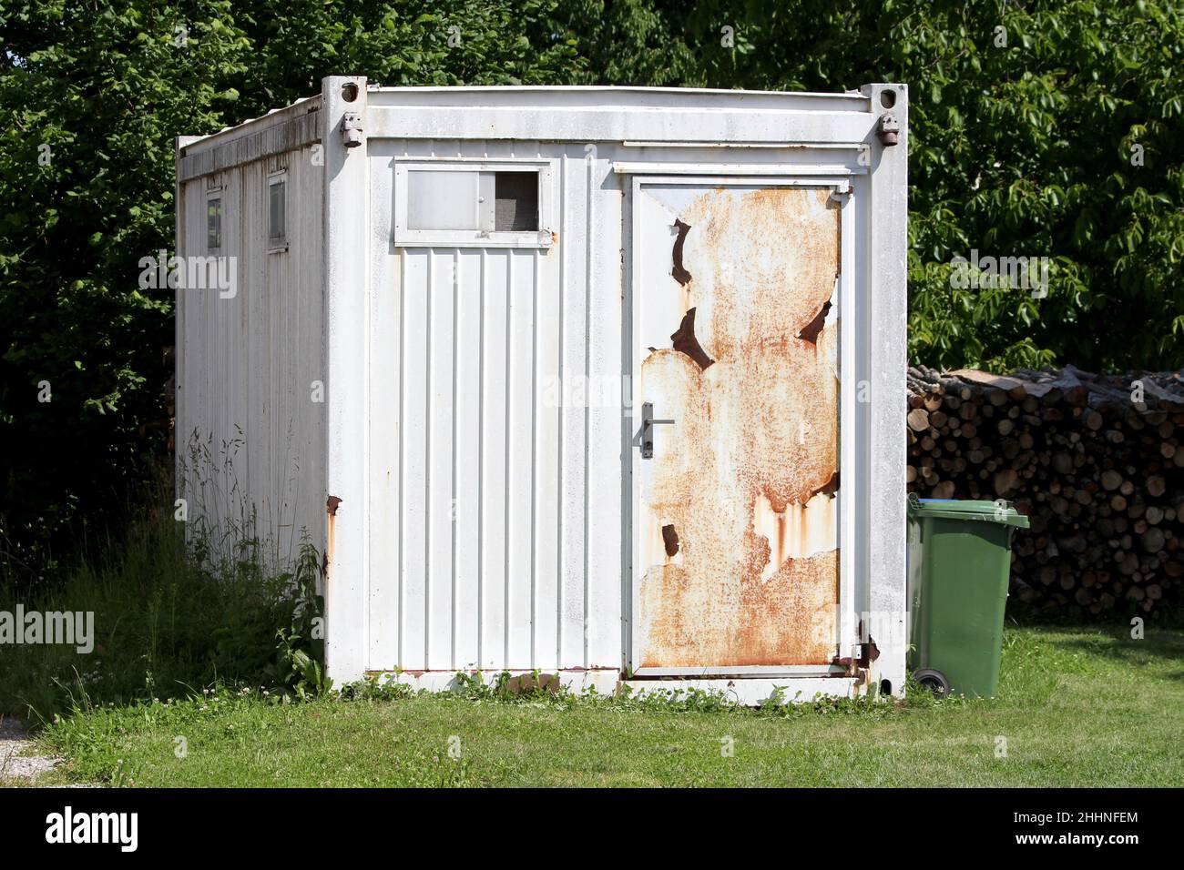 White old abandoned industrial shipping container converted into ...