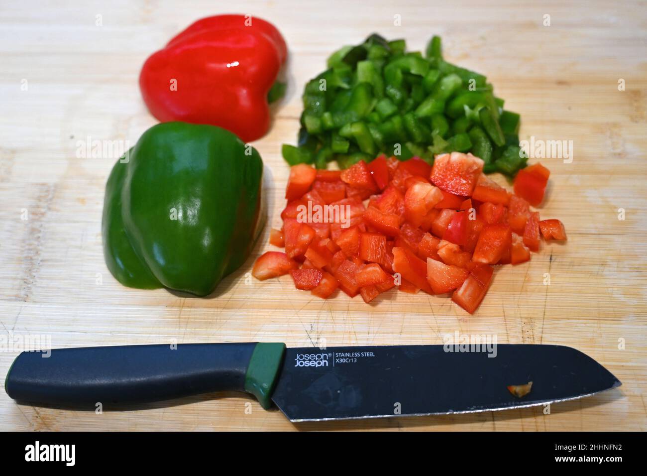 chopped peppers food preparation, cooking in the kitchen Stock Photo ...