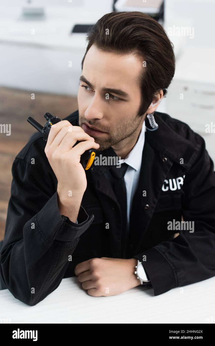 Black security guard radio set hi-res stock photography and images - Alamy