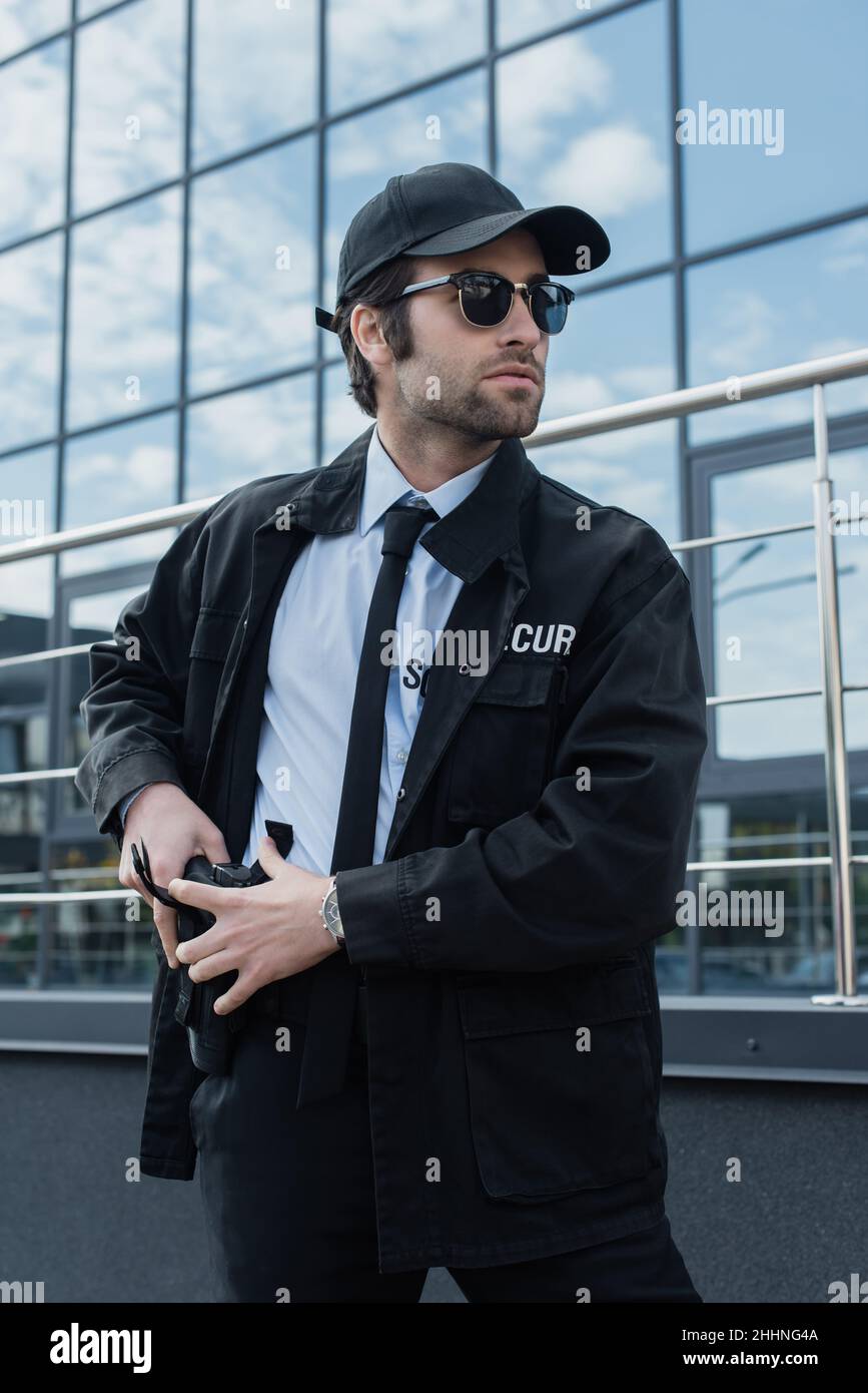 Security guard taking man away hi-res stock photography and images - Alamy