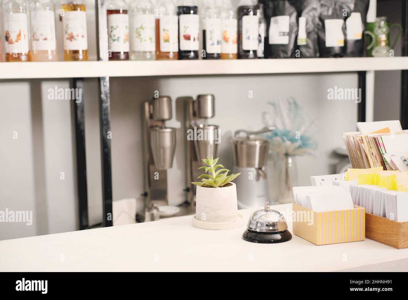 cafe counter with flower and service Ring bell For call waiter at bar ...