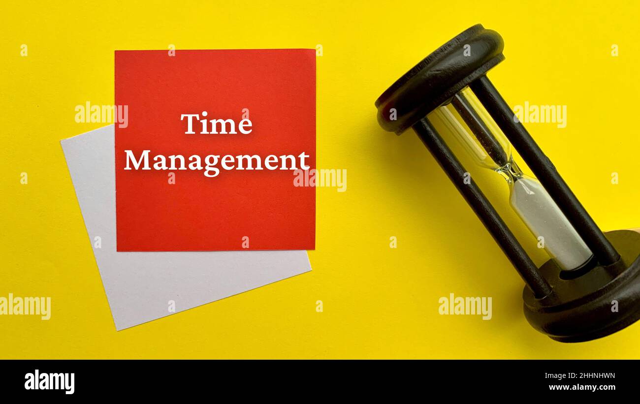 Time management text on red notepad Business concept Stock Photo - Alamy