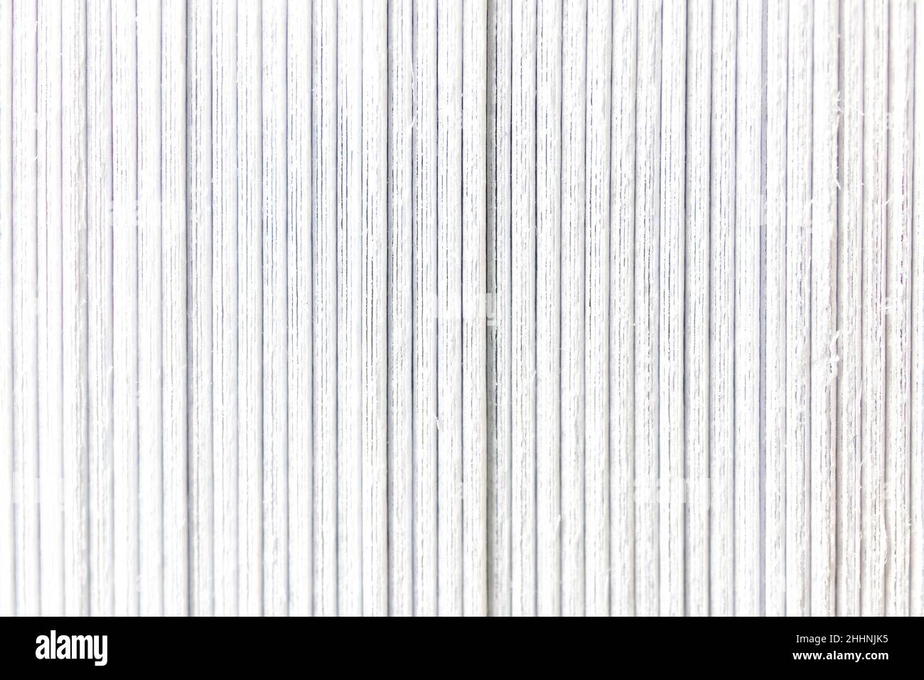 Macro of white paper sheets in lateral view Stock Photo - Alamy