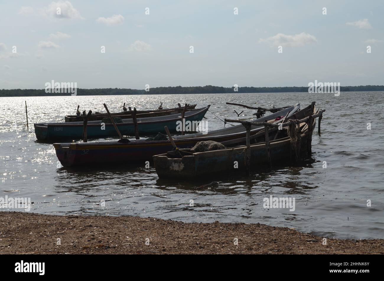 Urban beach anchored boats hi-res stock photography and images - Alamy