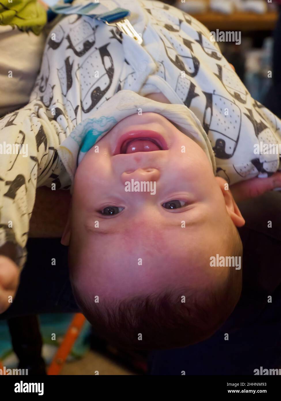 Baby boy laying on his back, UK Stock Photo - Alamy