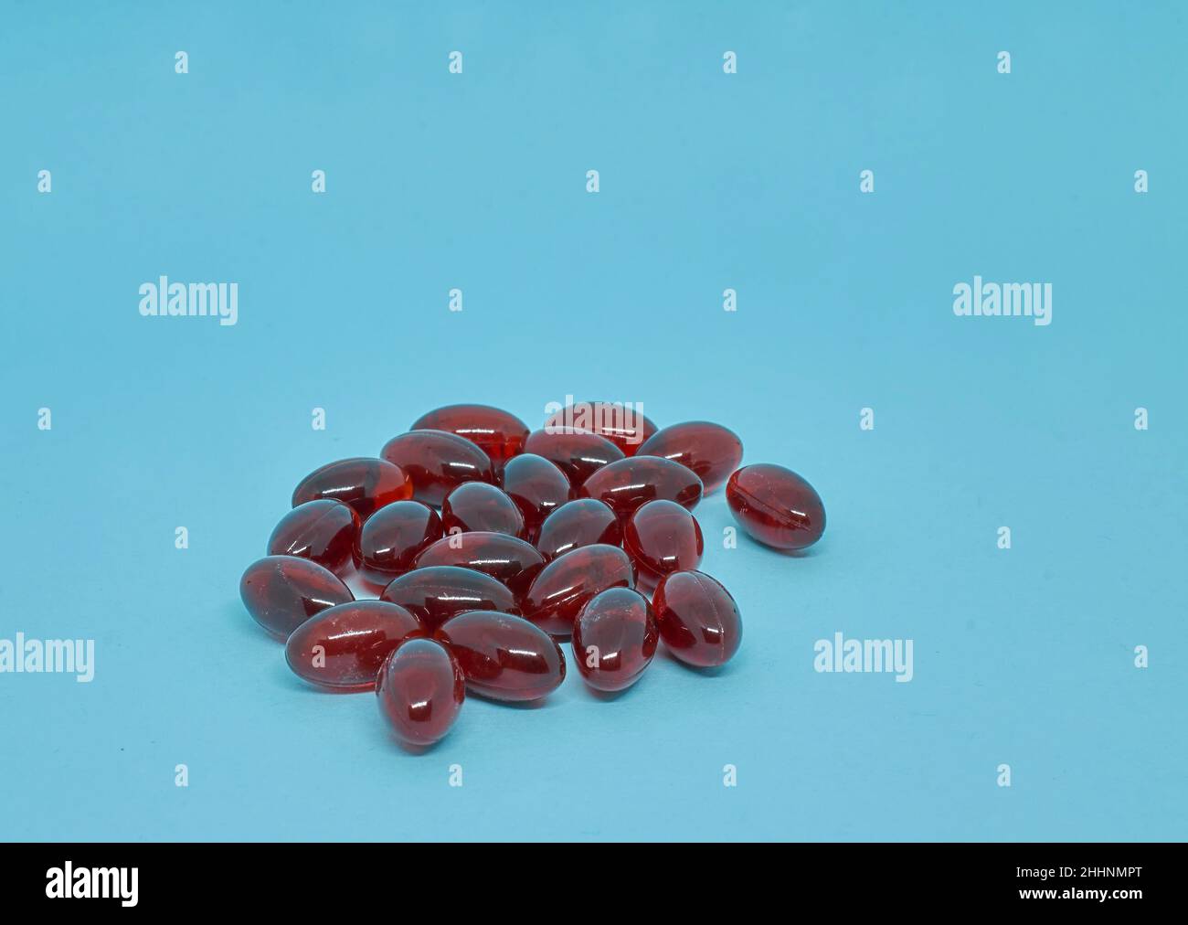 Dark red medical capsules hi-res stock photography and images - Alamy