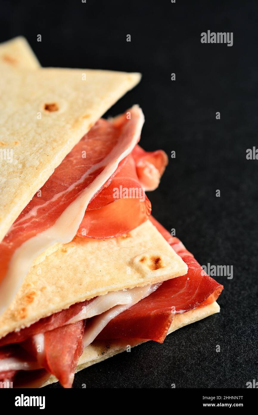 Italian Piadina with Prosciutto Crudo. Flatbread with raw ham Stock ...