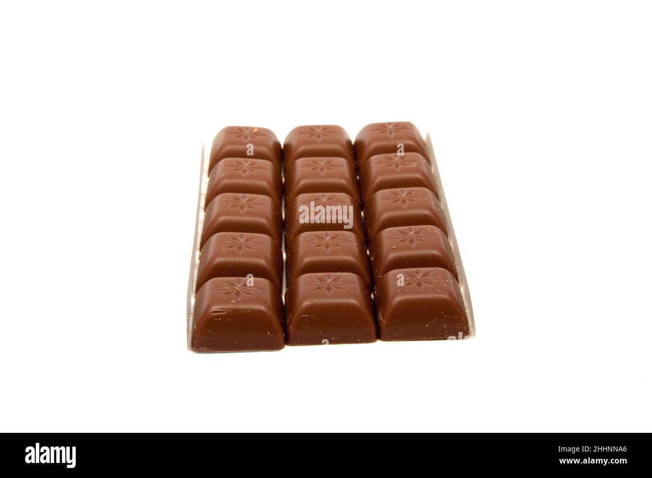 Chocolate squares in white Cut Out Stock Images & Pictures - Alamy