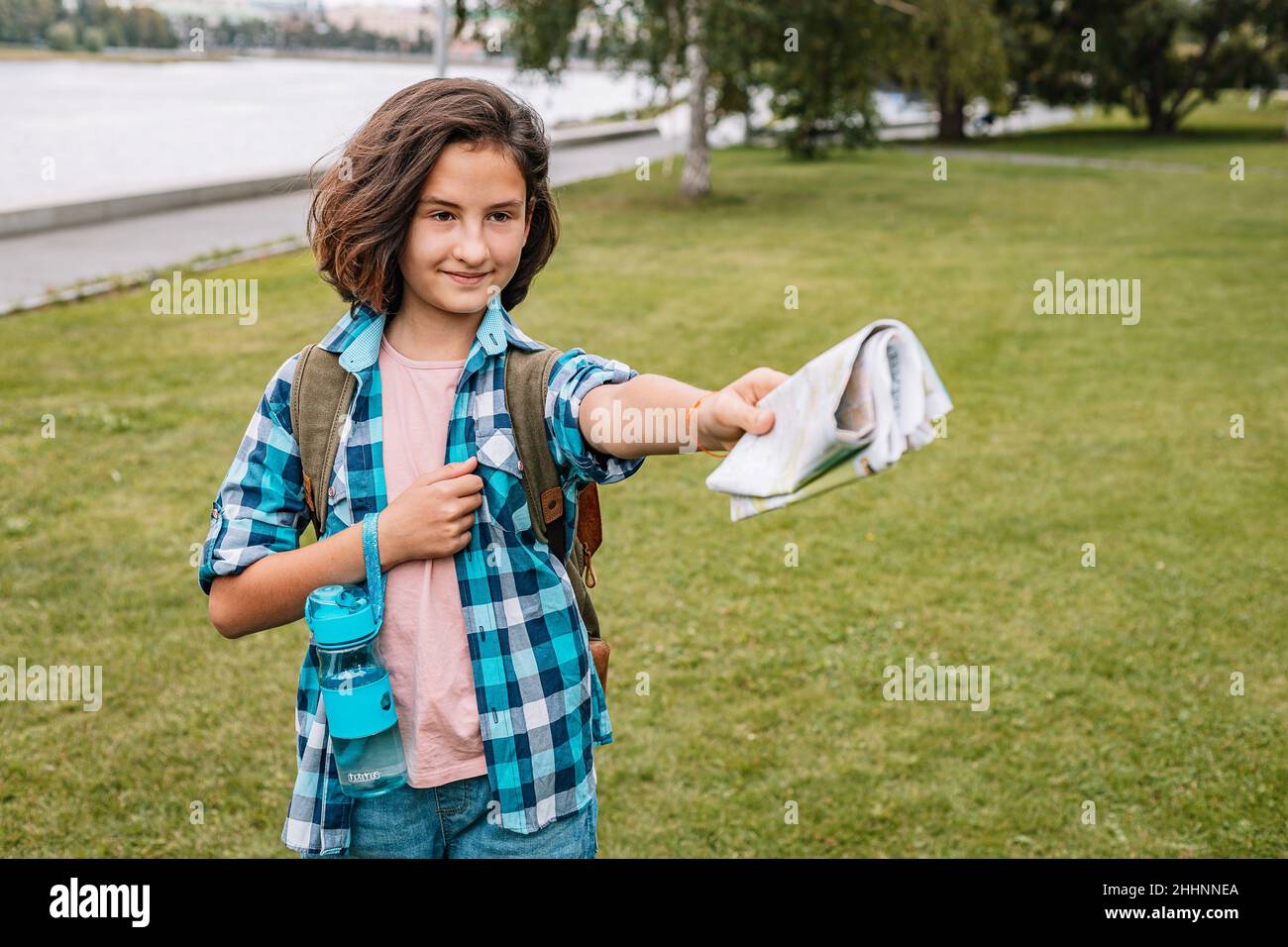 Emotional hipster young girl travels around the city. Cute brunette ...