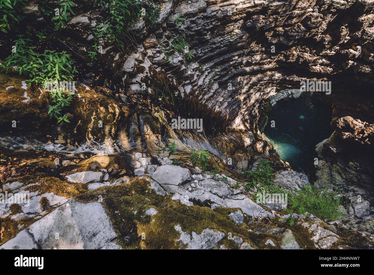 Wild Waterfall and Cliffs of Karst Gorge Stock Photo - Alamy