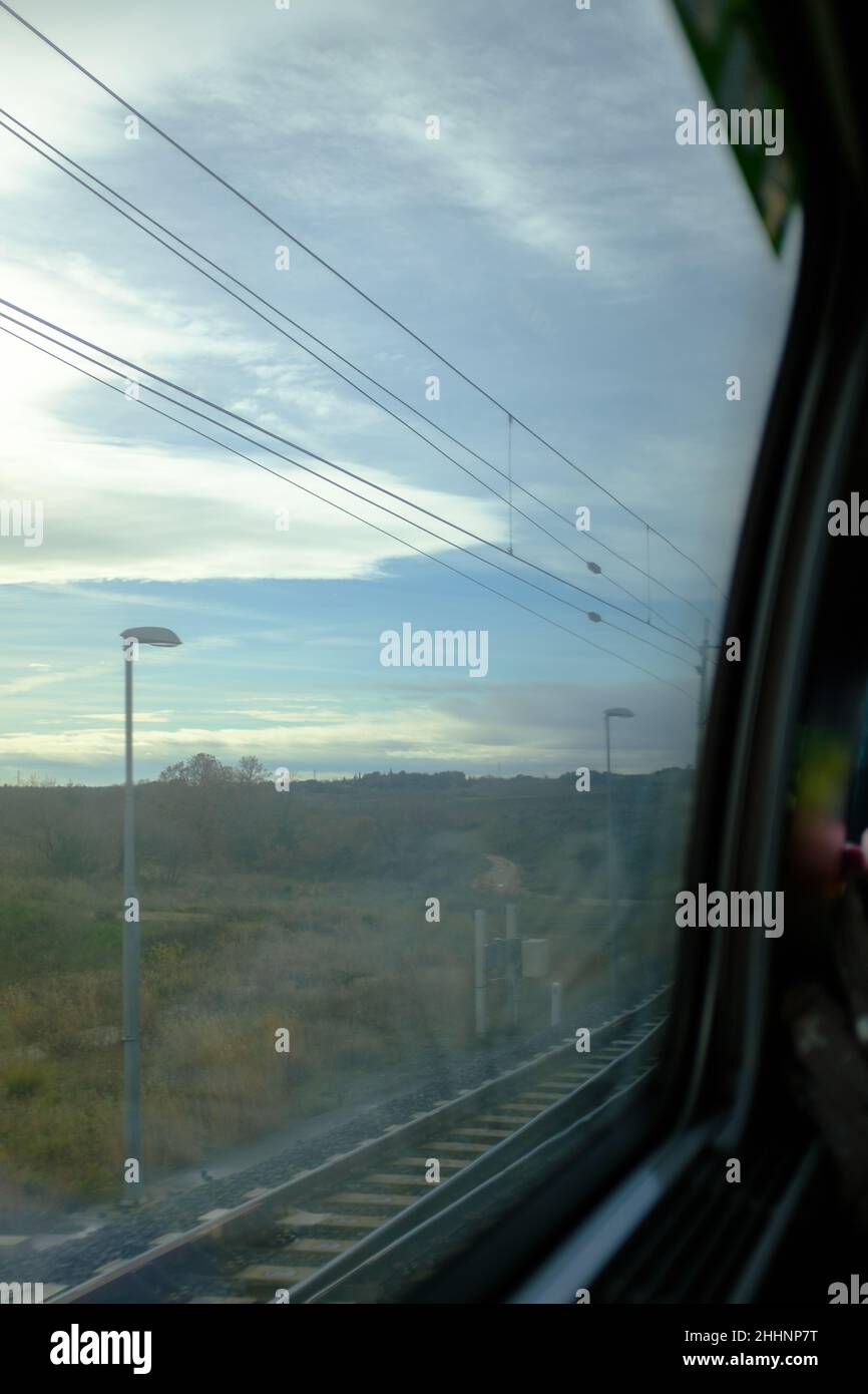 Rural landscape seen from a train window in movement Stock Photo - Alamy