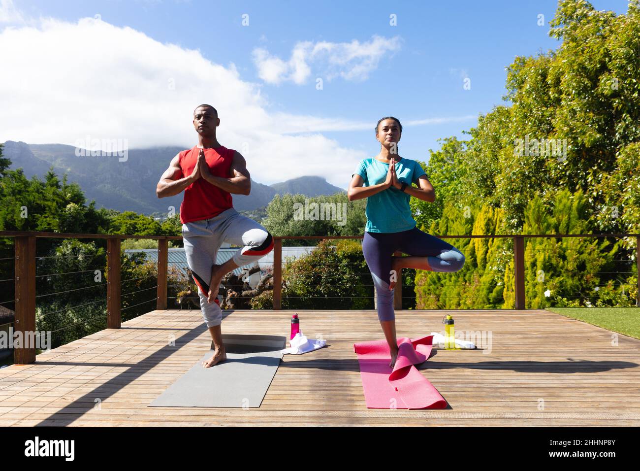 Young man stretching on terrace hi-res stock photography and images - Alamy