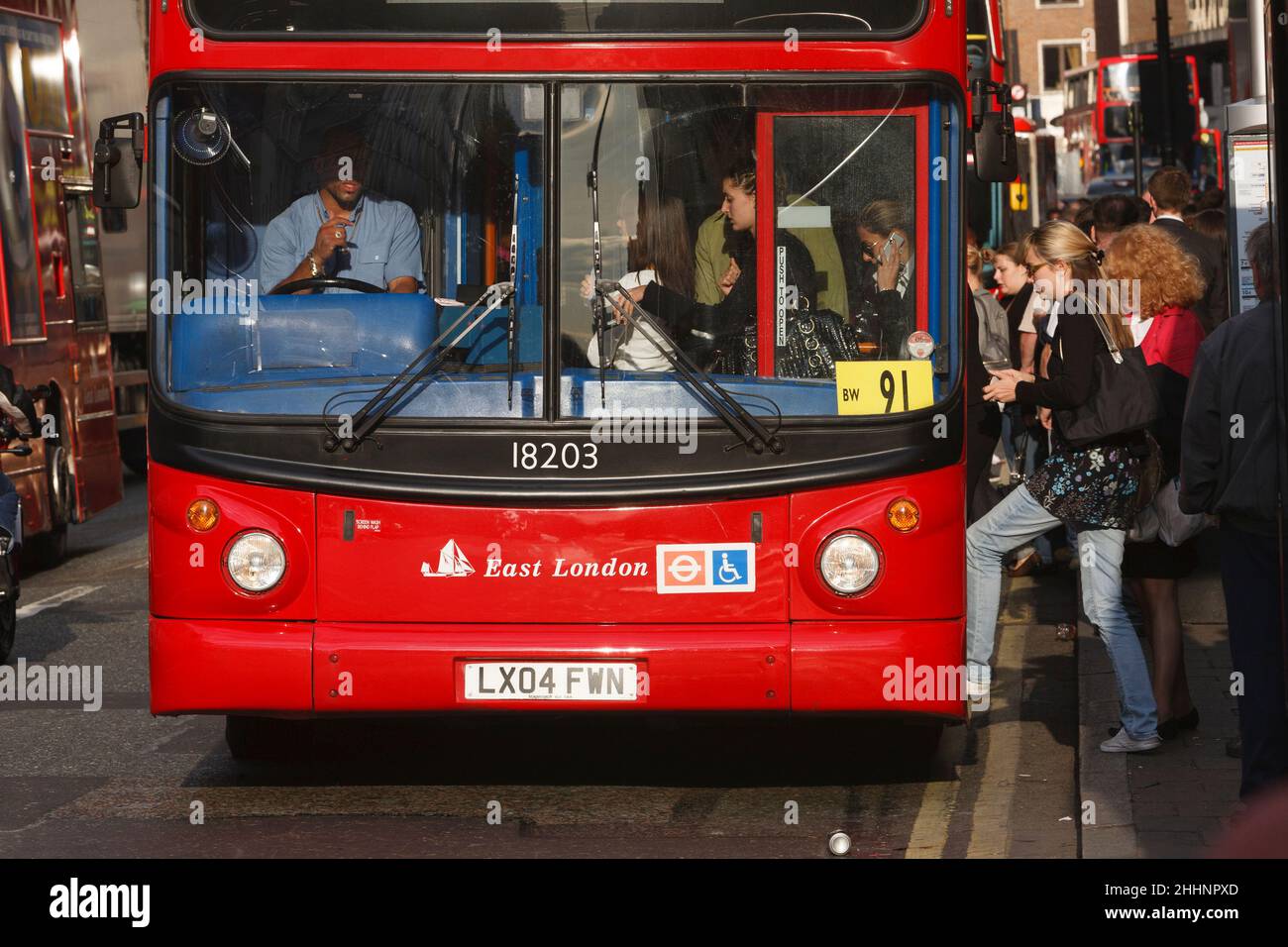 Commuters struggling to get on already overcrowded buses caused by the ...