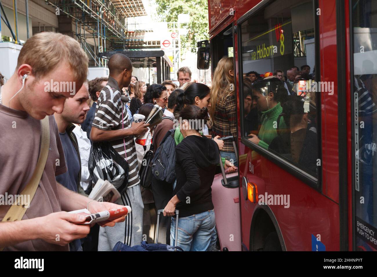 Commuters struggling to get on already overcrowded buses caused by the ...