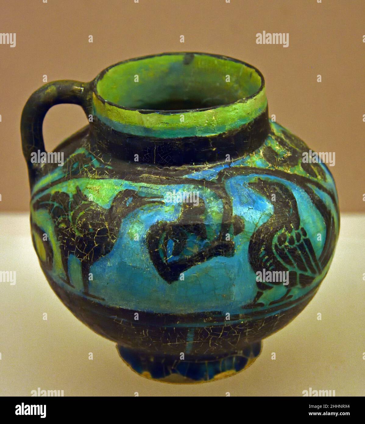 Ewer 12th century AD Fritware, turquoise glazing carved through a black ...