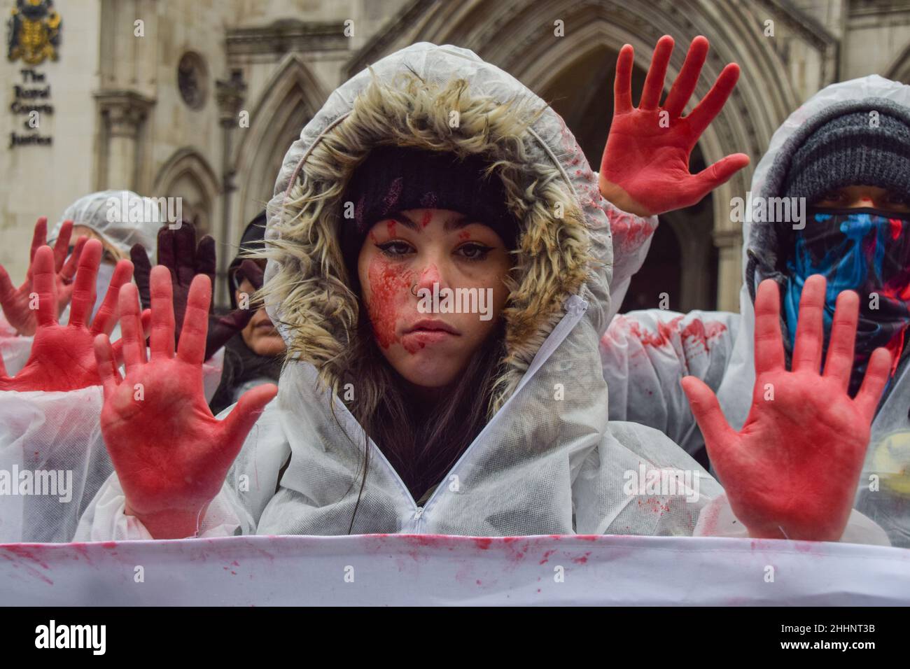 Our blood your hands protest sign hi-res stock photography and images ...