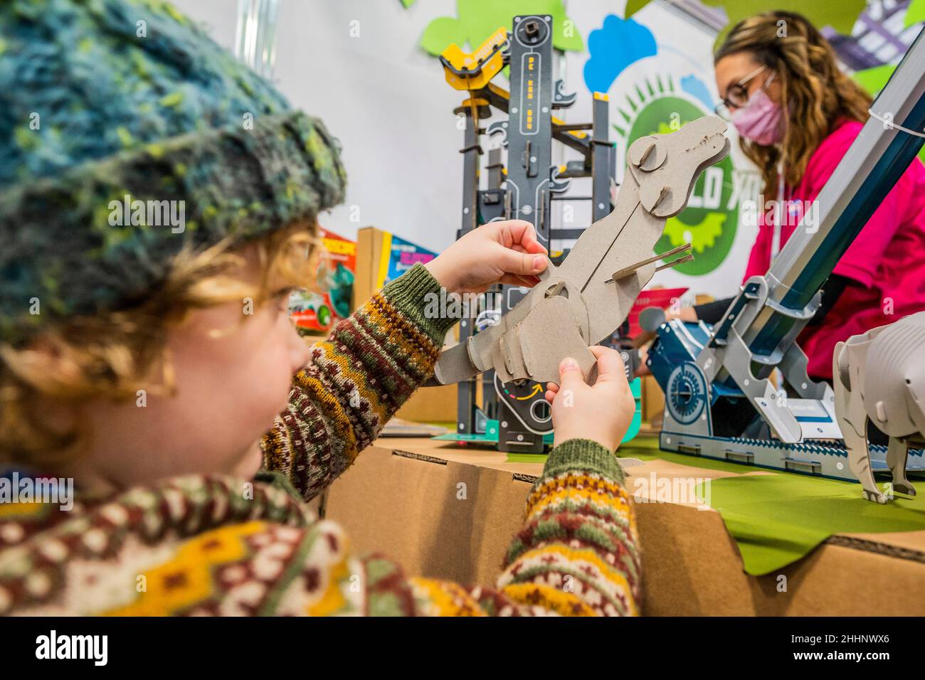 London, UK. 25th Jan, 2022. Playing with cardboard toys from teh Build ...