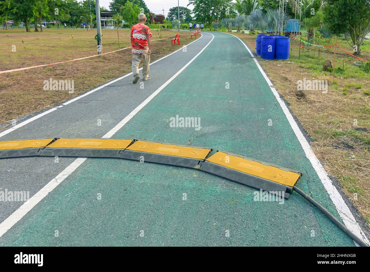 Black and yellow heavy plastic covers for people and vehicle to cross ...