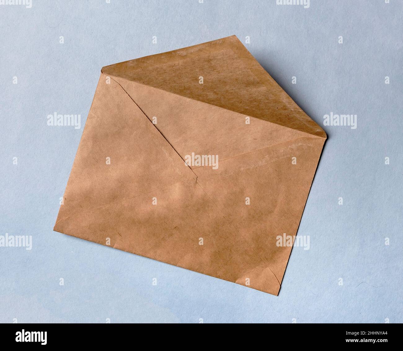Craft brown envelope. Open empty envelop Stock Photo - Alamy