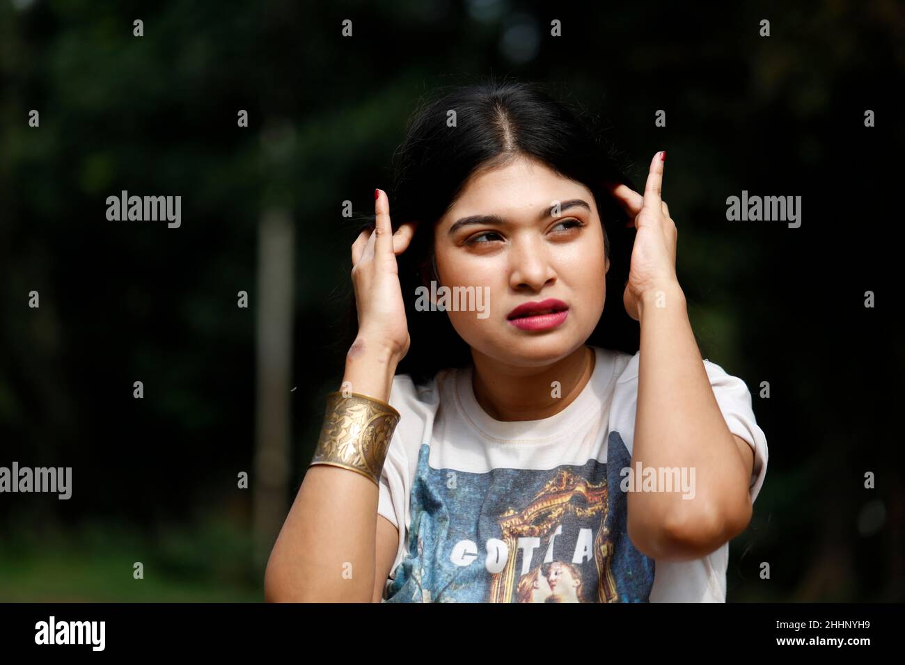 Dhaka, Bangladesh - December 10, 2021: Model Marshia Shawon is showing off her headache, Dhaka ...