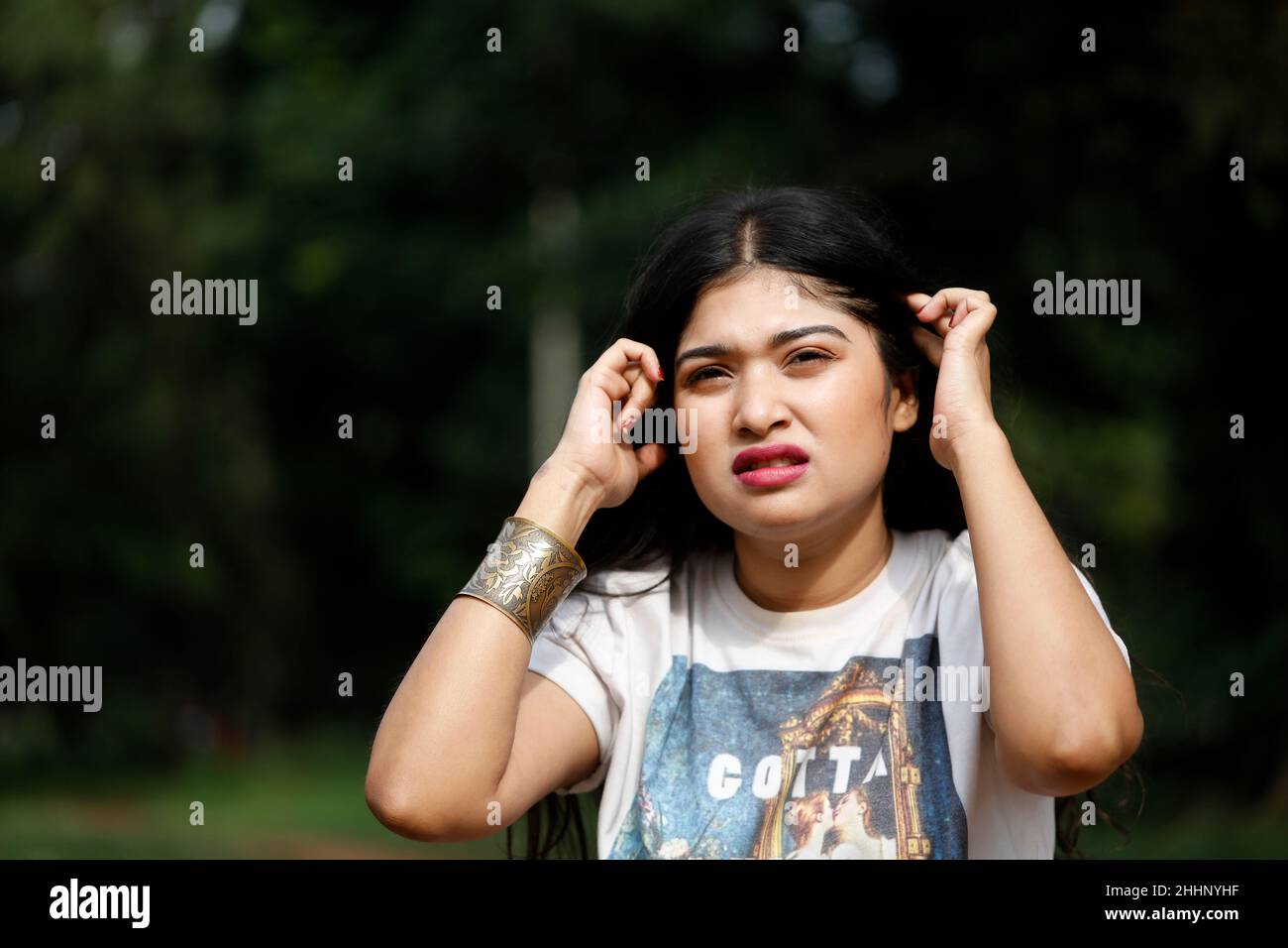 Dhaka, Bangladesh - December 10, 2021: Model Marshia Shawon is showing off her headache, Dhaka ...