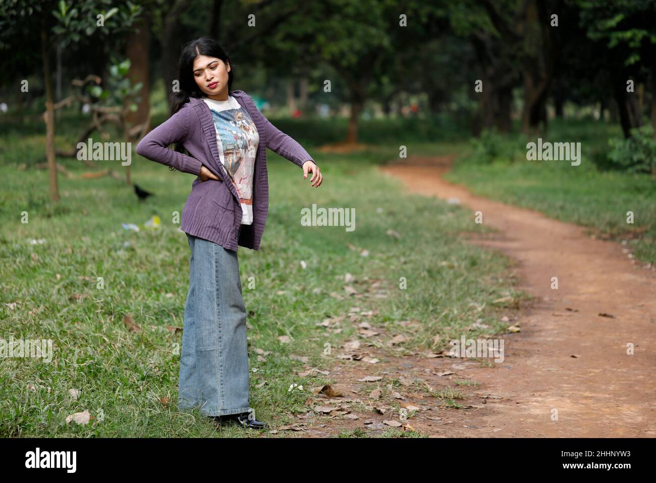 Dhaka, Bangladesh - December 10, 2021: Model Marshia Shawon is showing off her Back pain, Dhaka ...