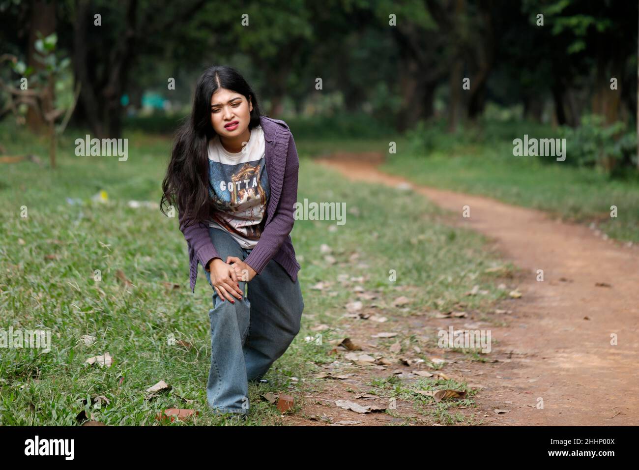 Dhaka, Bangladesh - December 10, 2021: Model Marshia Shawon is showing off her Knee pain, Dhaka ...