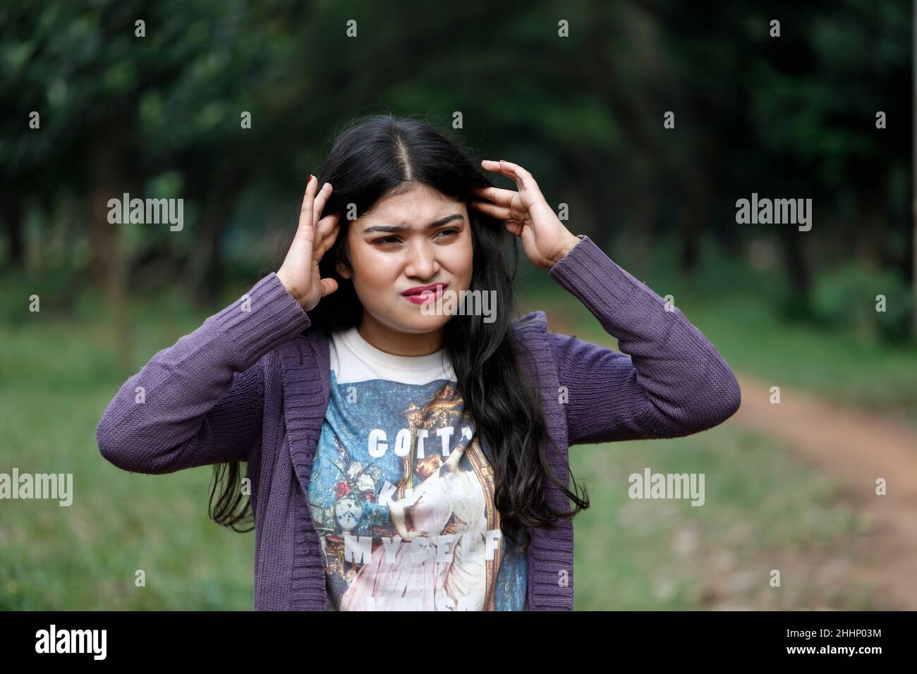Dhaka, Bangladesh - December 10, 2021: Model Marshia Shawon is showing off her headache, Dhaka ...