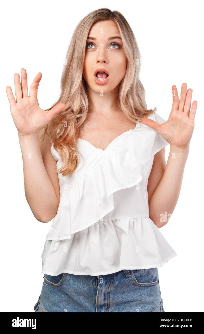 Surprised young woman shouting over white isolated background Stock ...