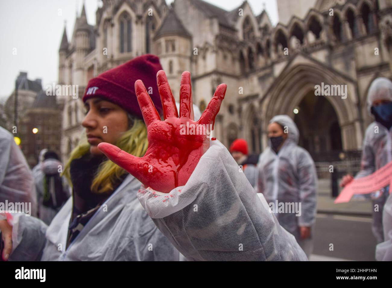 Our blood your hands protest sign hi-res stock photography and images ...