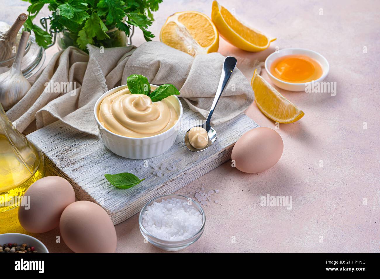 Natural mayonnaise and ingredients on a light background Stock Photo ...