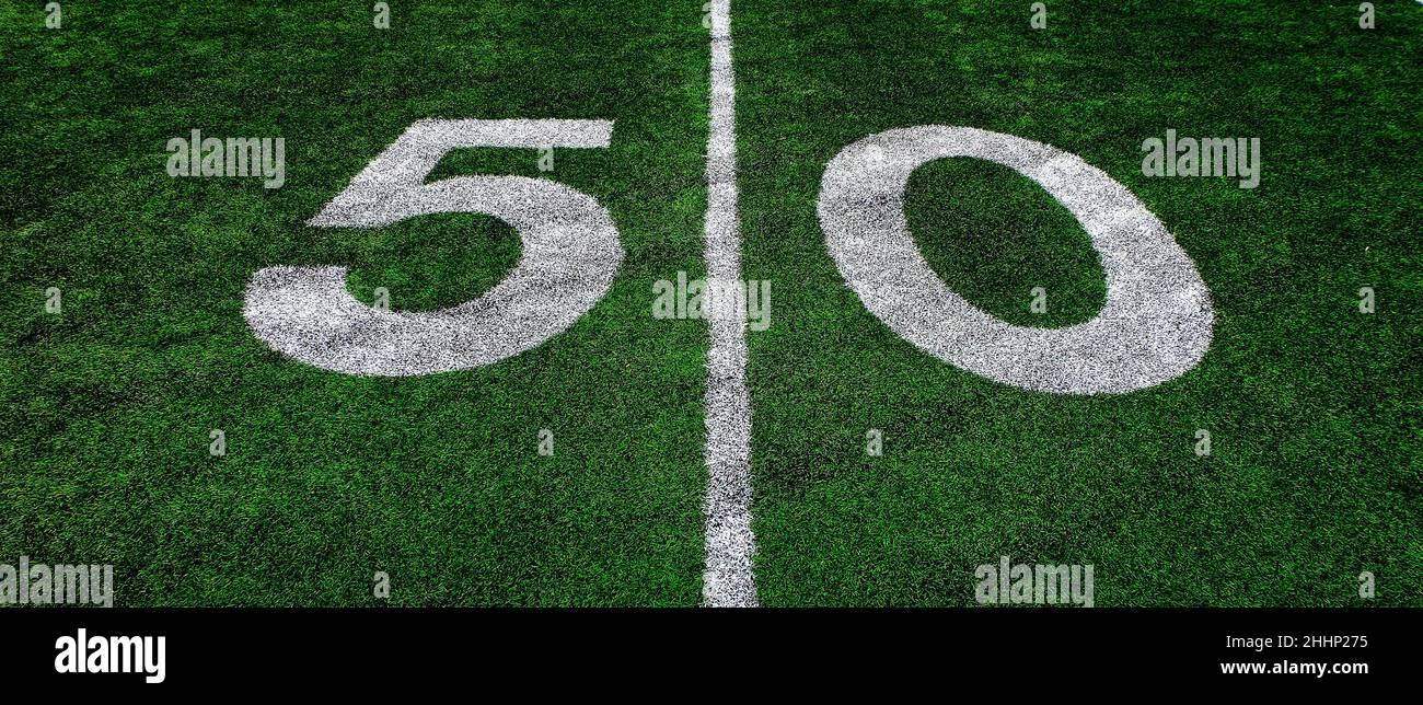 Football field green grass white yard markers to touchdown competition ...