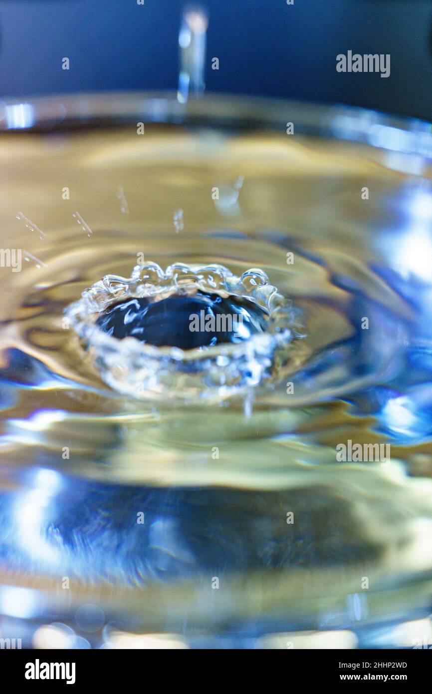 Water droplets make an impact when hitting the surface Stock Photo - Alamy