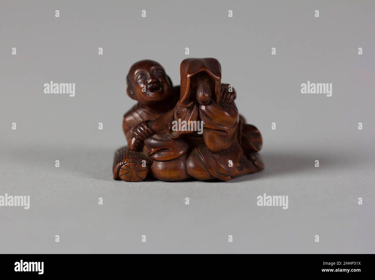 Netsuke of Tokutaro and Fox Disguised as a Woman 19th century Japan ...