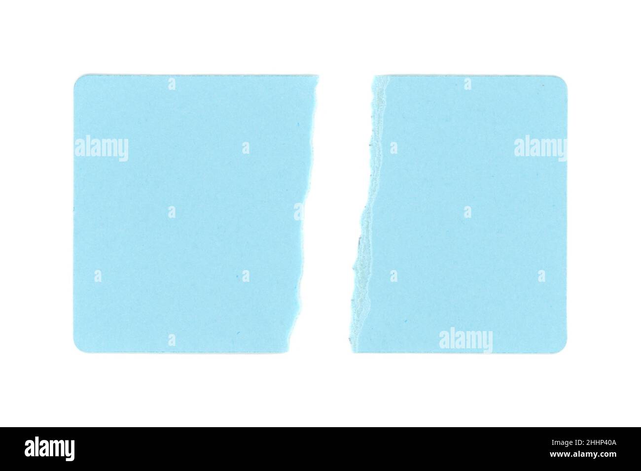 torn light blue paper tag label over white Stock Photo - Alamy